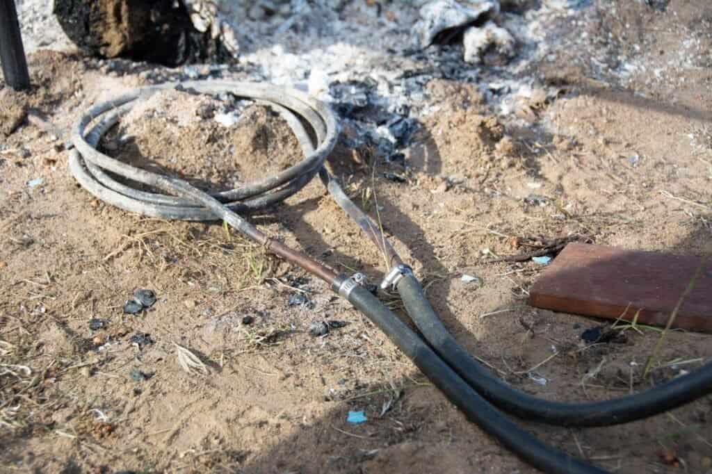 DIY hot water for camping or off grid using a fire